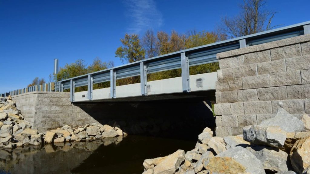 Geosynthetically Confined Soil Wall Abutment - Short Span Steel Bridges
